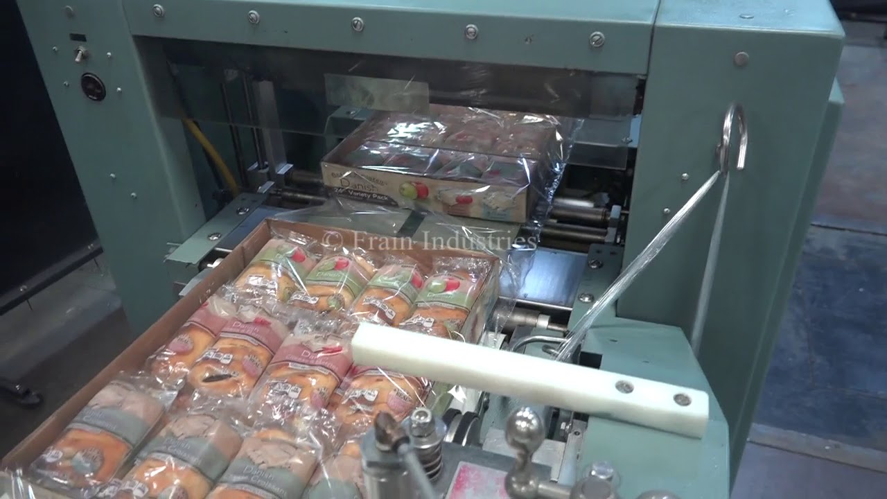 Shanklin F1, automatic continous motion, flow thru shrink wrapper - YouTube