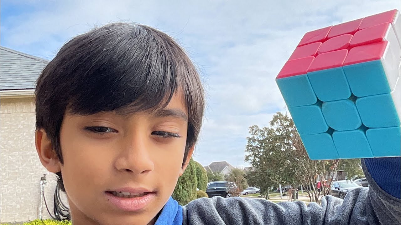 Hula hooping and solving a rubix cube - YouTube