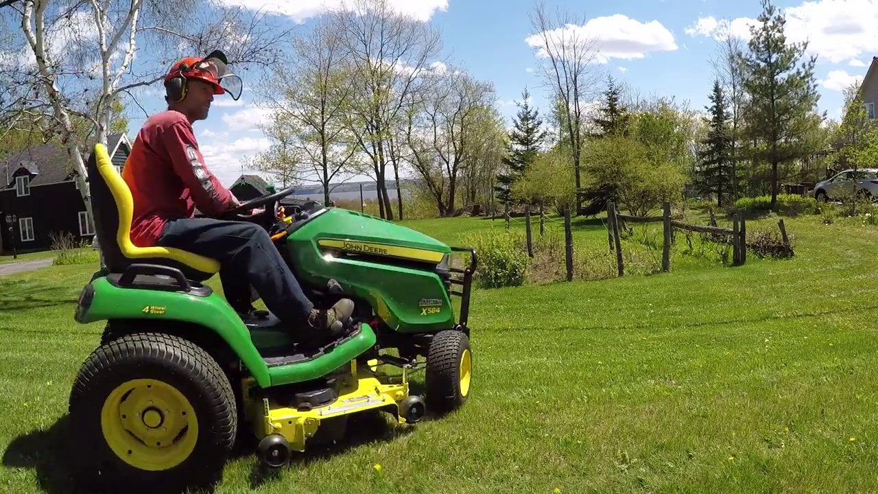 Brand new John Deere X584 mowing a residential lawn. (05/21/2018) - YouTube