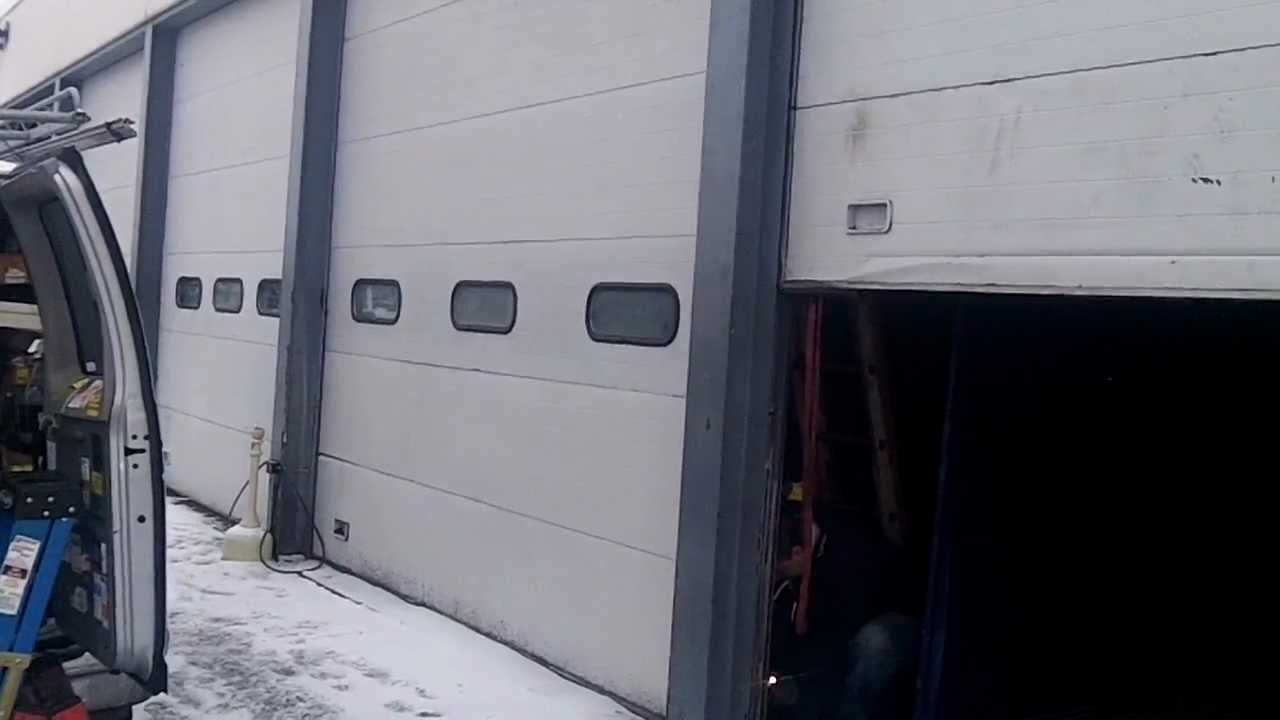 A Raynor Tri-Core Garage Door in Joliet,IL we fixed again * the car ...