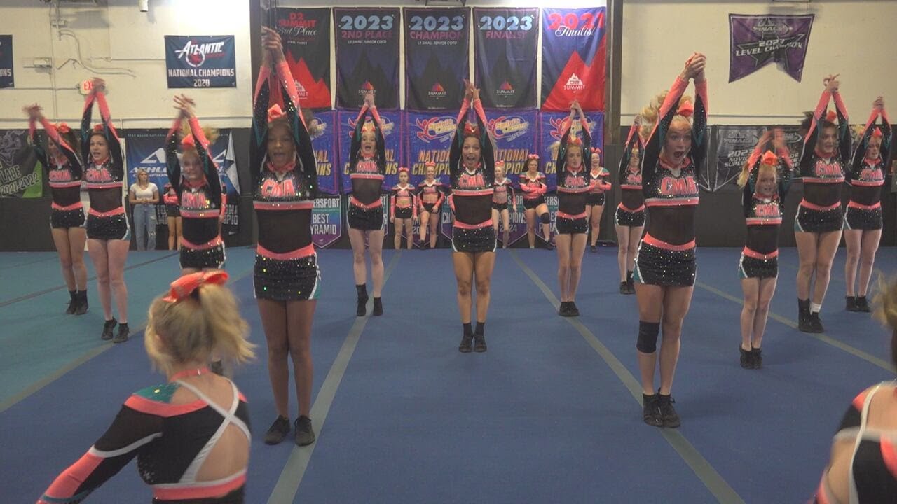 Big 10 Cheer off to compete in Orlando - YouTube