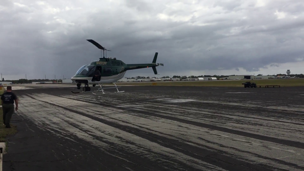 Sheriff Helicopter Hovering Then Landing On The Dolly - YouTube