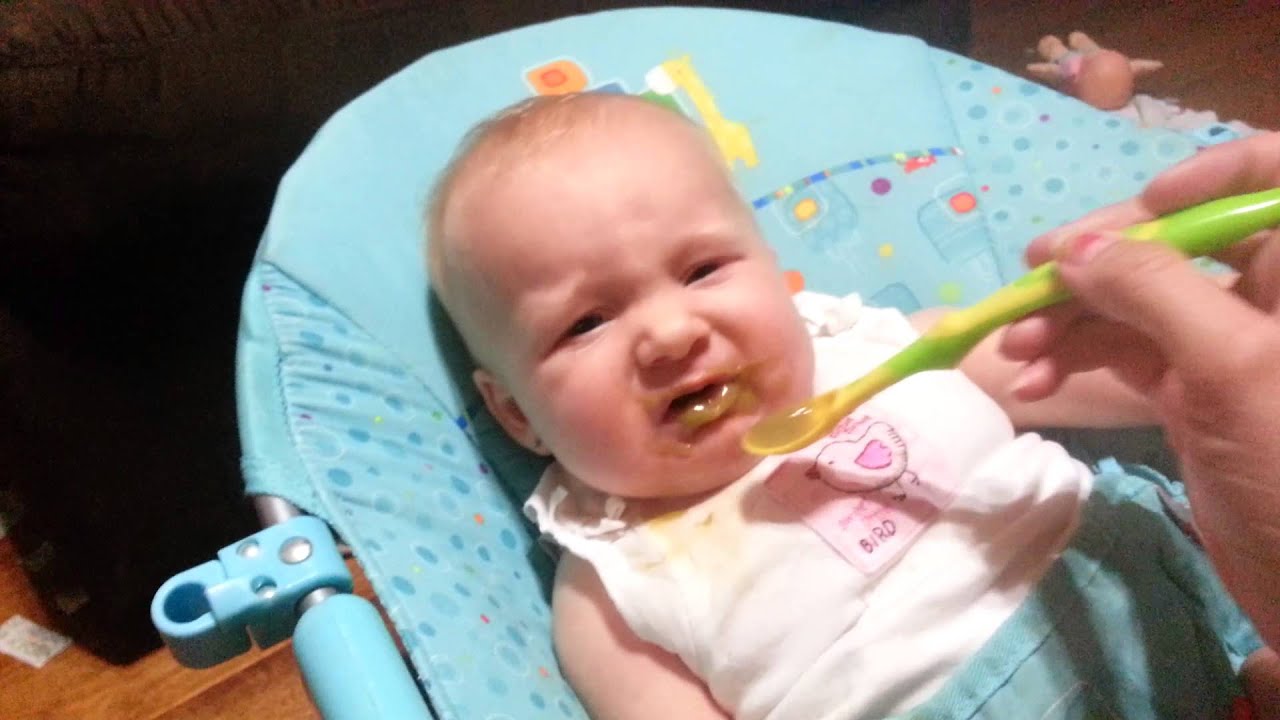 Alex eating baby food for the first time - YouTube