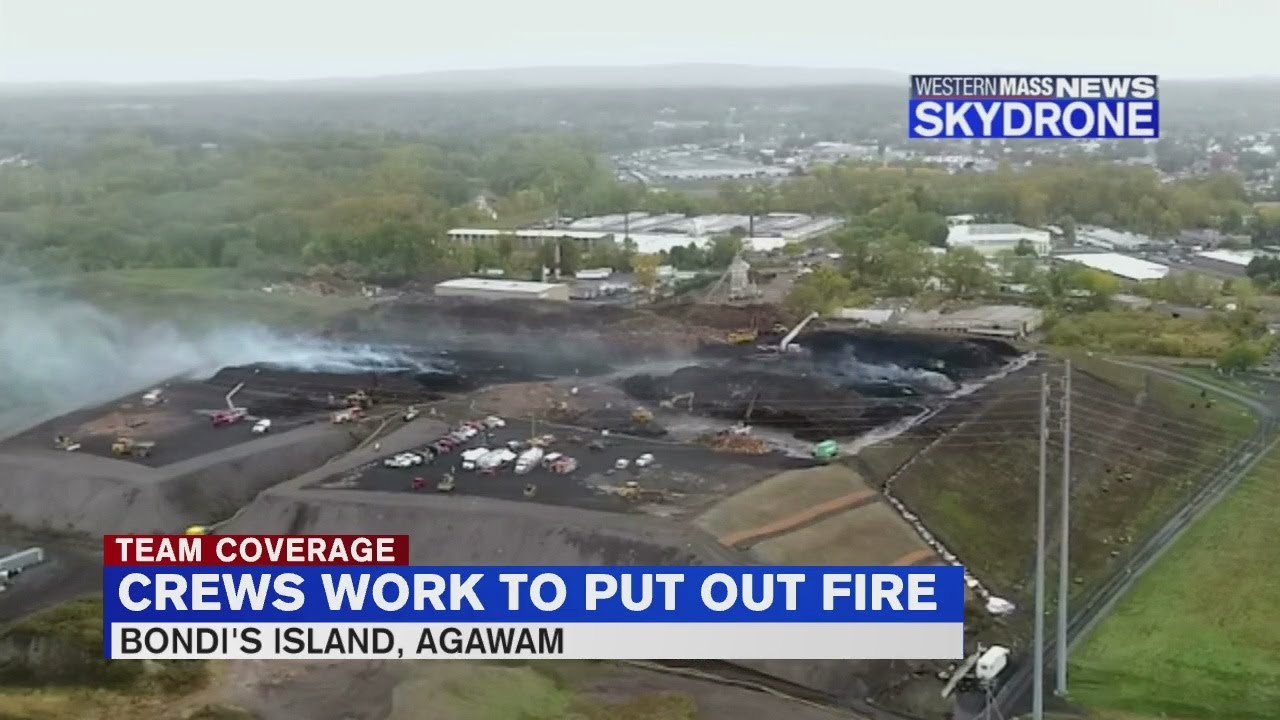 Crews continue to extinguish a landfill fire at Bondi's Island - YouTube
