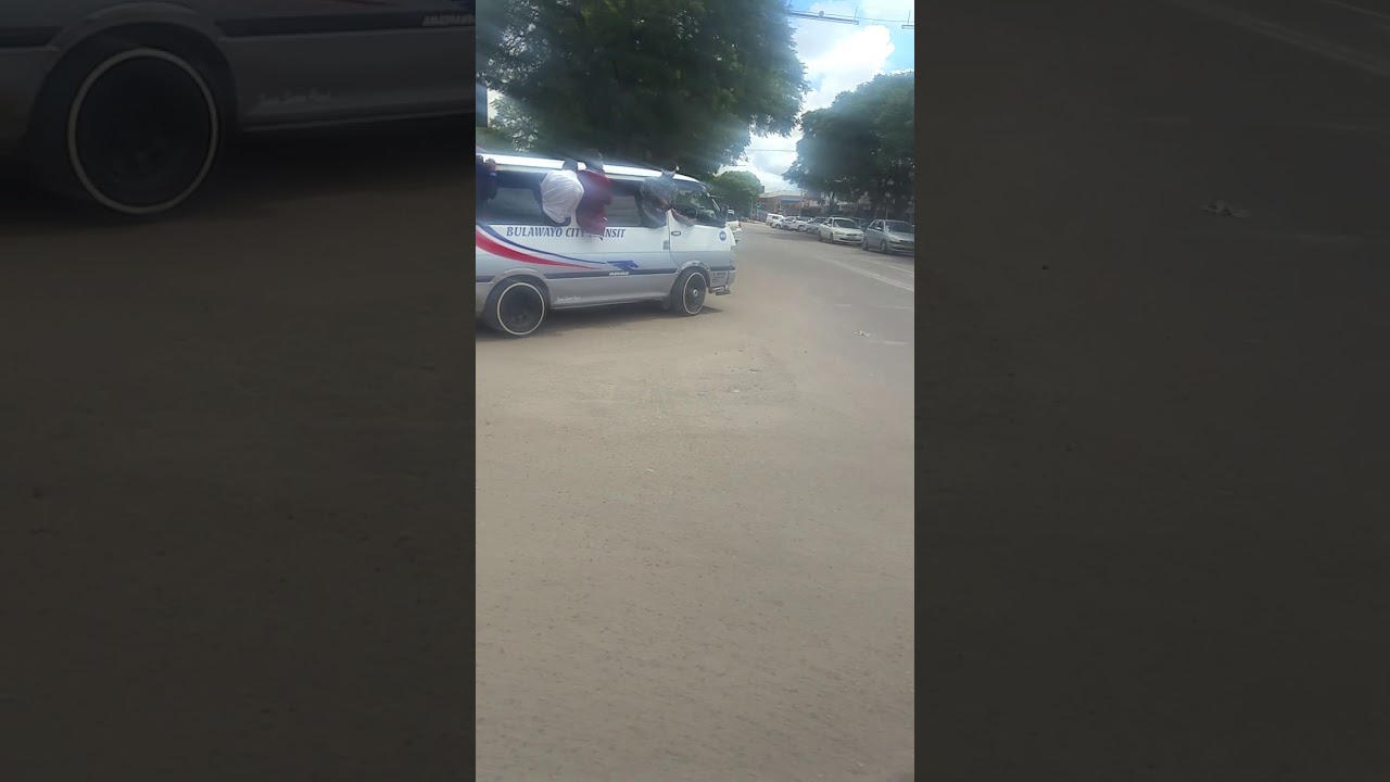 BULAWAYO KOMBIS ALLOW SCHOOL KIDS TO RIDE SEATED ON WINDOWS - YouTube