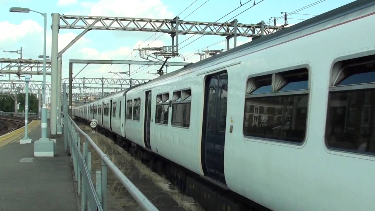 (HD) 12 Car Class 321 formation passes Bethnal Green northbound - YouTube