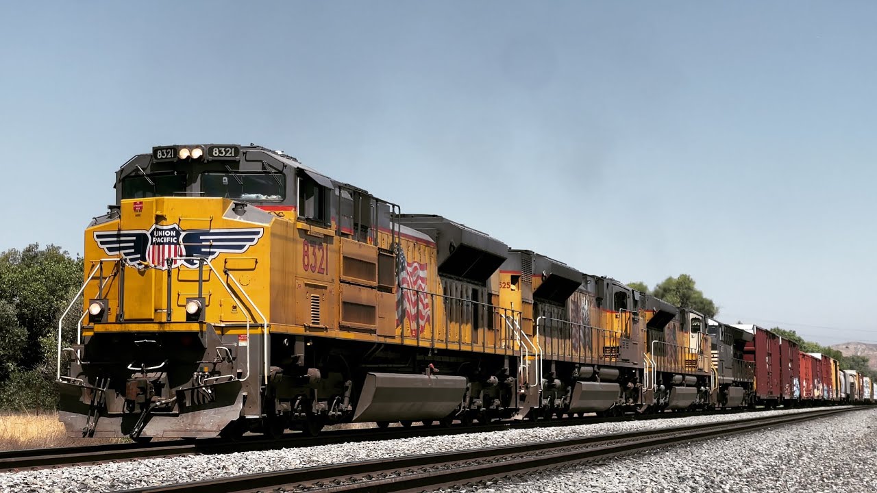 UP 8321 leads a manifest on the sunset route along with a race - YouTube