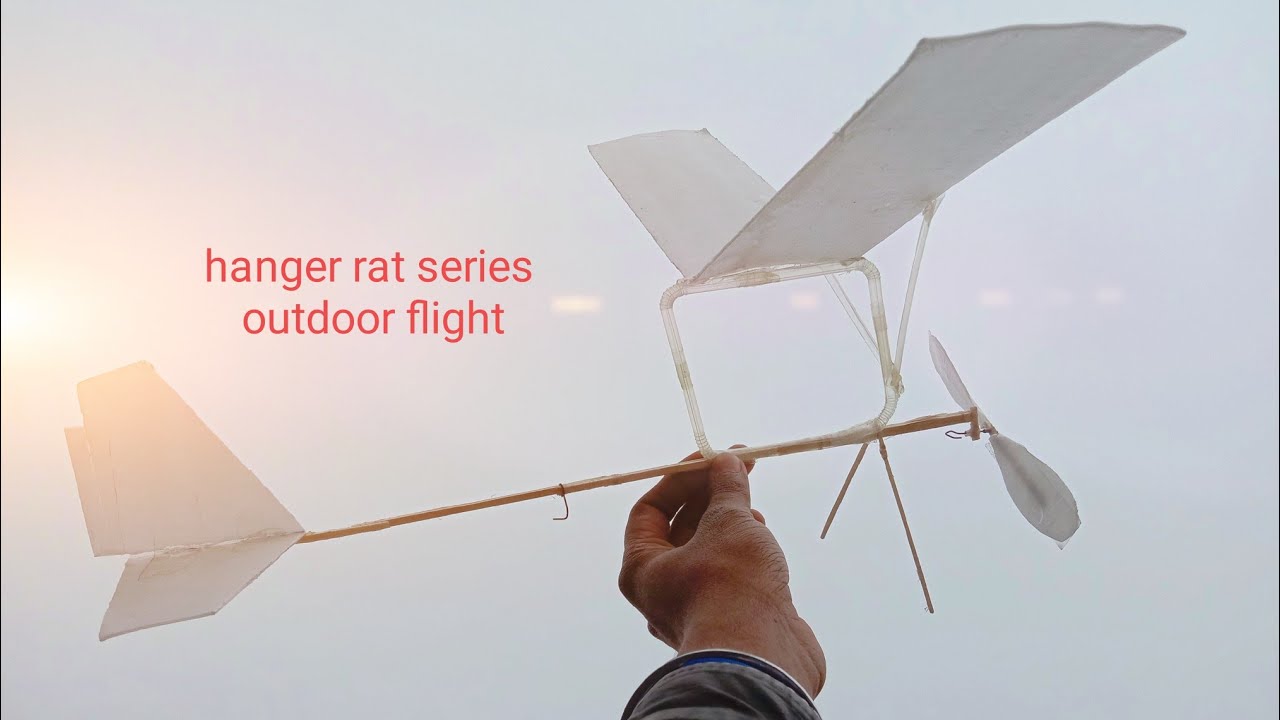 Rubber band powered hanger rat airplane outdoor flight - YouTube