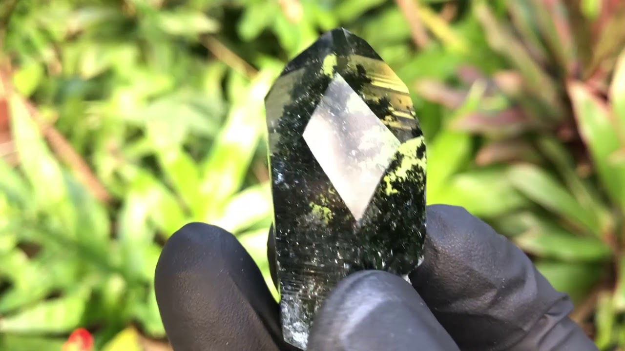 A window quartz crystal with a giant window from the Swiss alps - YouTube
