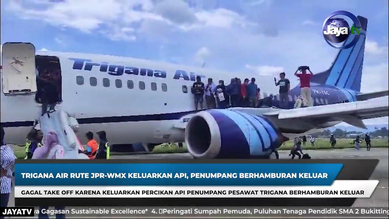 TRIGANA AIR RUTE JPR WMX KELUARKAN API, PENUMPANG BERHAMBURAN KELUAR - YouTube