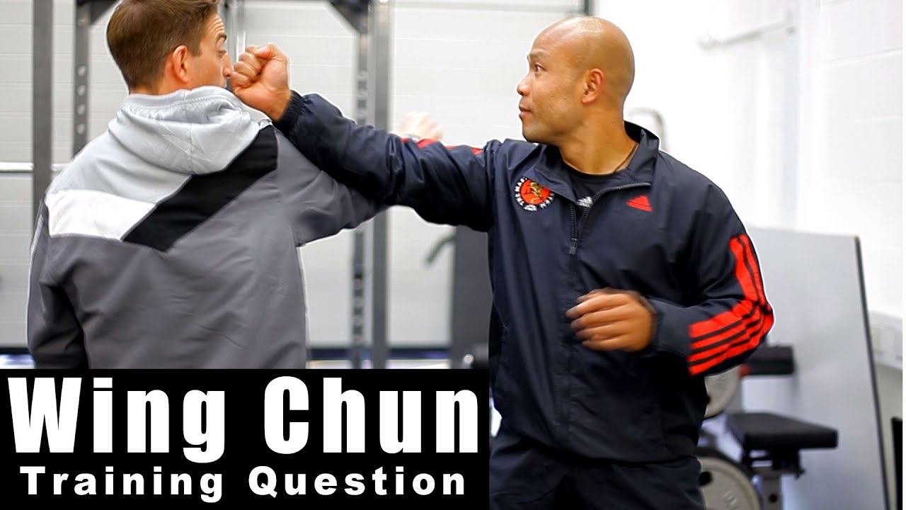 Wing Chun Training - Wing Chun How to block a straight punch. Q1 - YouTube