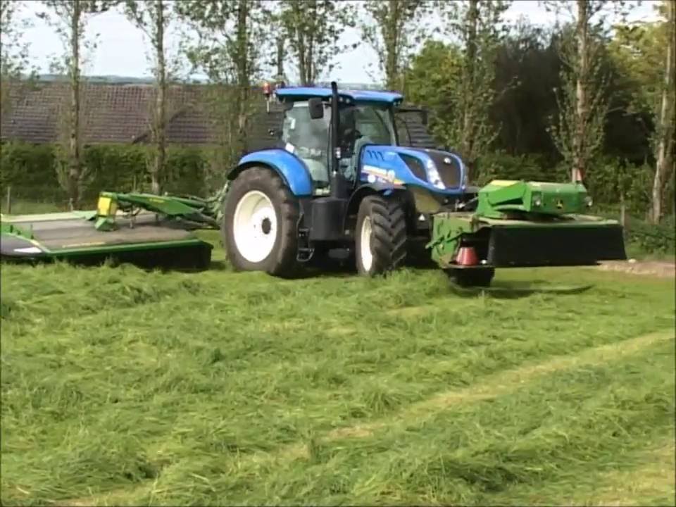 New Holland T7.260 with John Deere butterfly mowers - YouTube