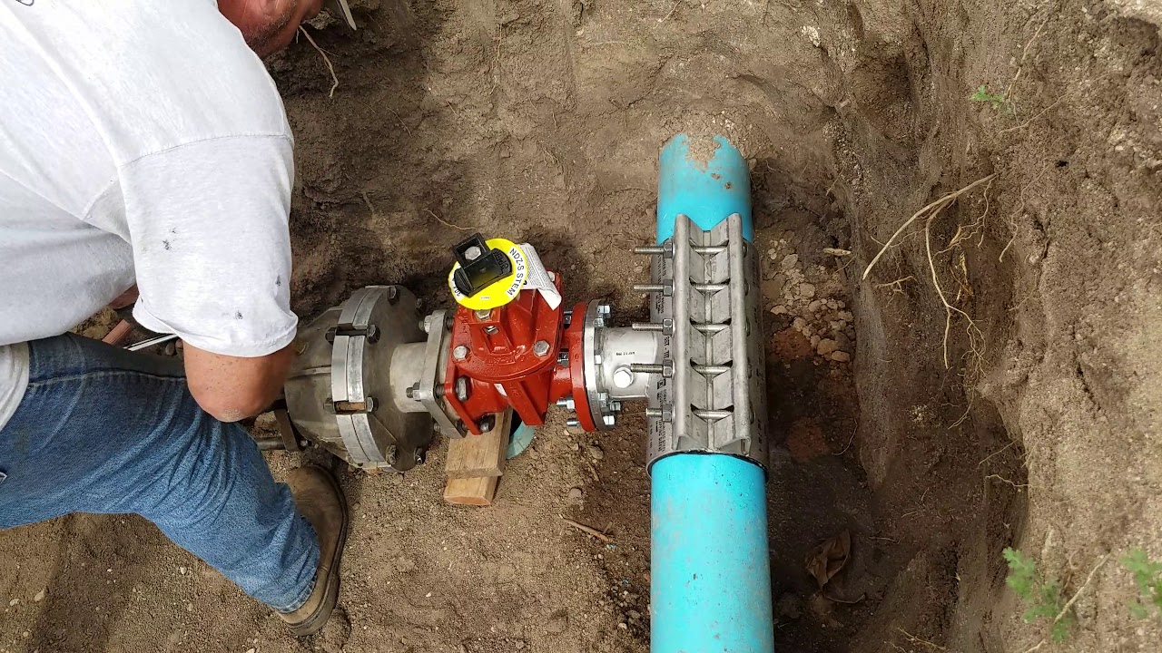 Hot tap of a 4 inch cut into a 6 inch main - YouTube