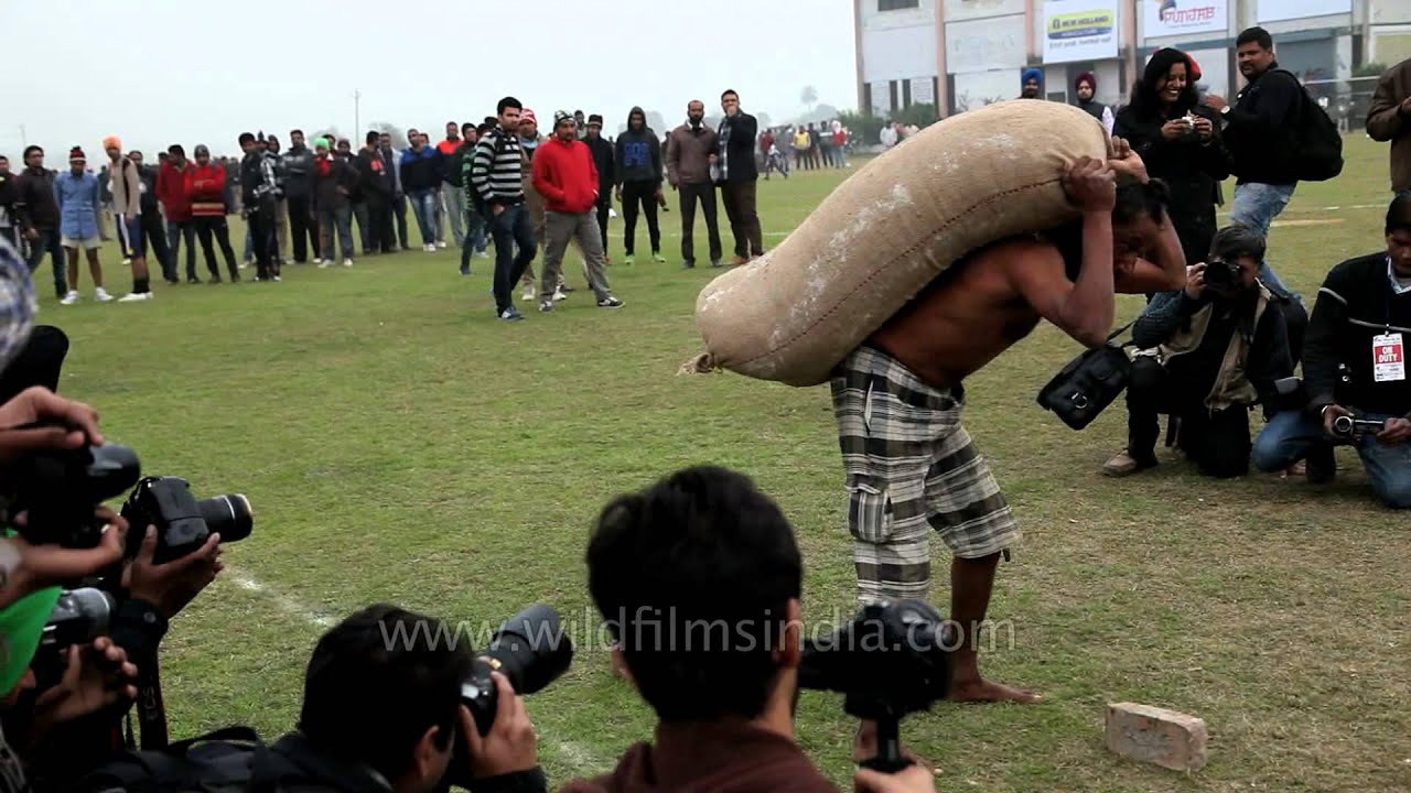 Sack lifting competition only at the Indian Rural Olympics - YouTube