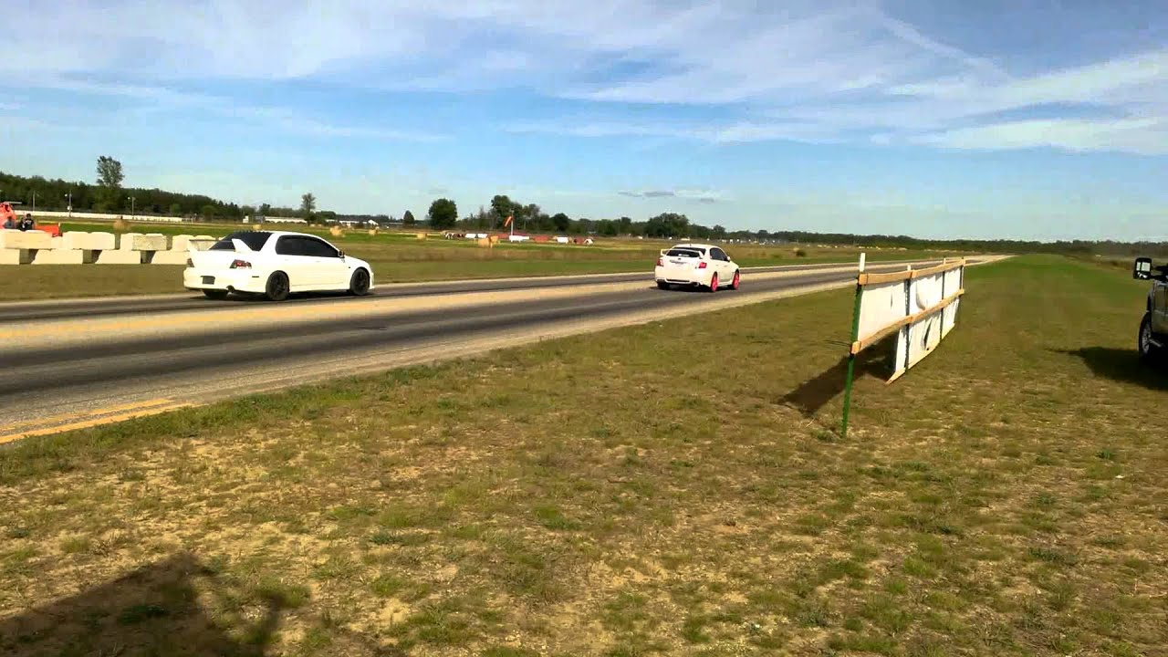 Subaru STi launch on drag radials - YouTube