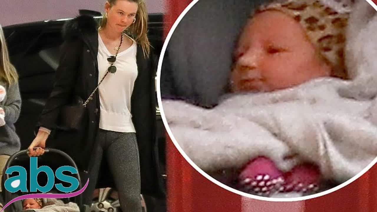 Behati Prinsloo's newborn daughter Gio Grace wears leopard print hat ...