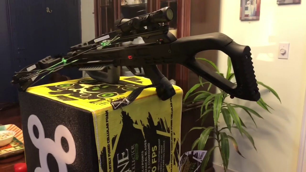 How to use a rope cocking device on a crossbow - YouTube