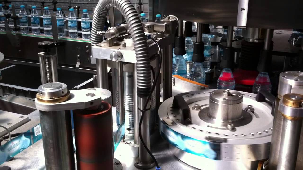 OPP rotary labelling machine - YouTube