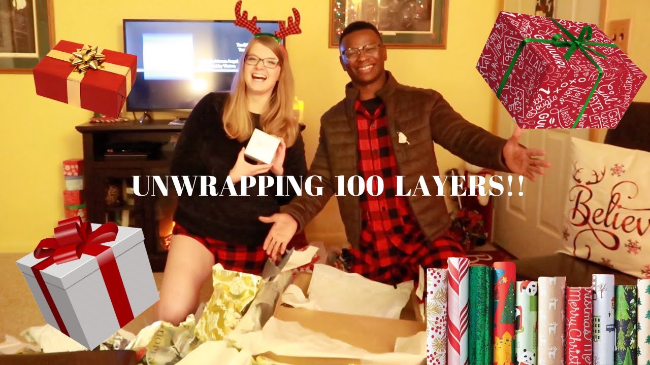 UNWRAPPING 100 LAYERS OF WRAPPING PAPER l WHAT WE GOT FOR CHRISTMAS ...