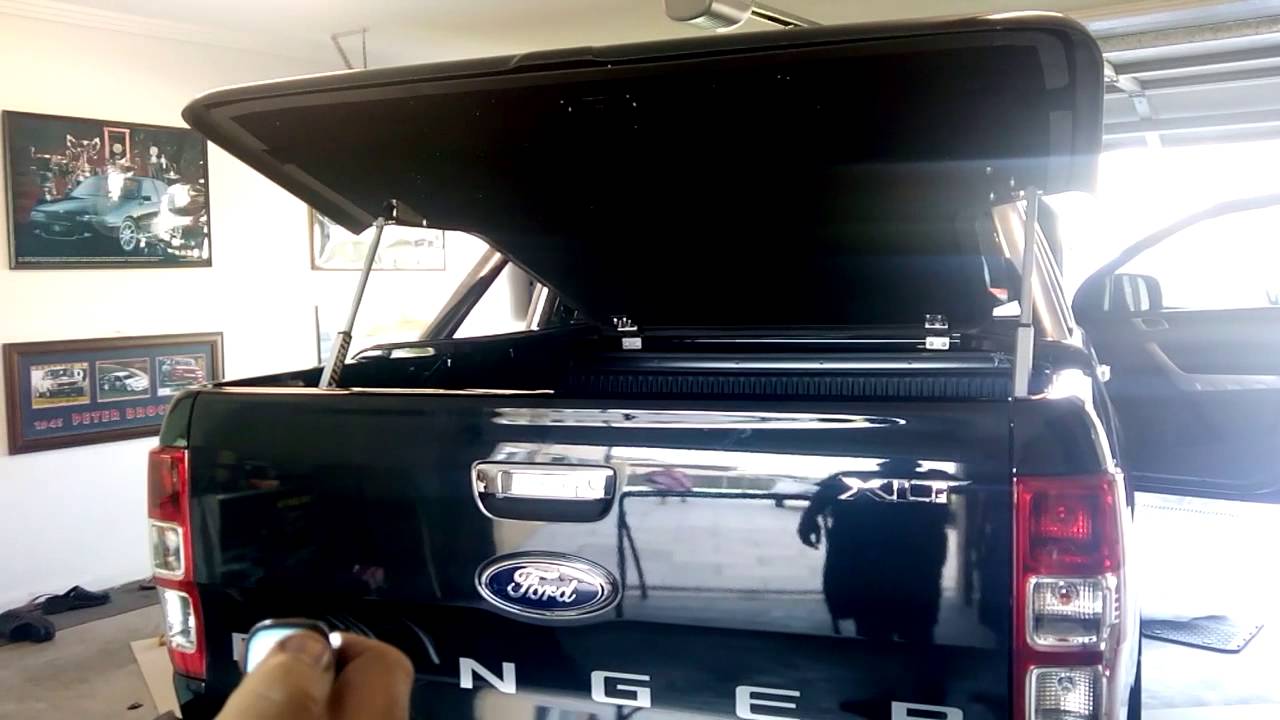 Ranger crew cab lid with auto lift feature - YouTube