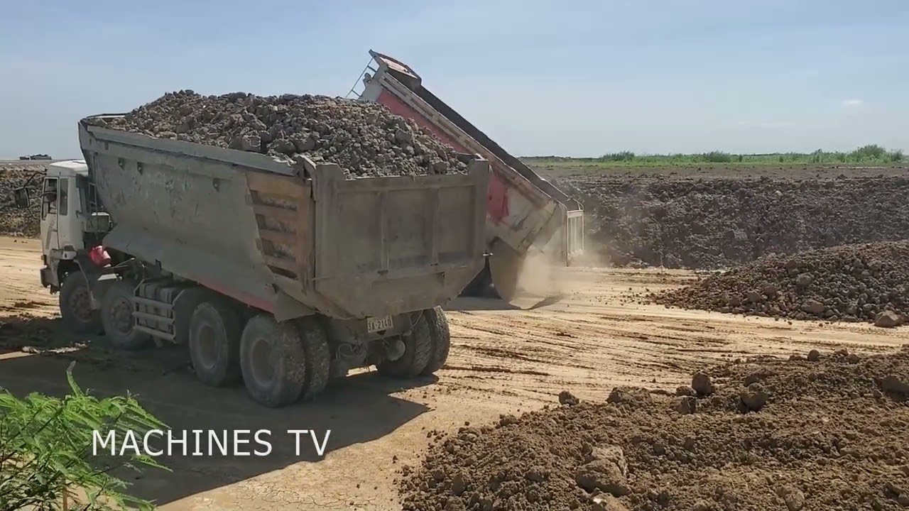 Technique New Road Building Dump Truck And Bulldozer Pushing Moving ...