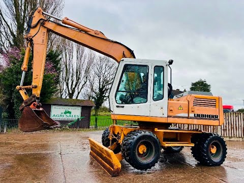 LIEBHERR 900 4WD WHEELED EXCAVATOR C/W QUICK HITCH & BUCKET - YouTube