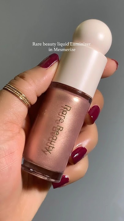 The best soft focus positive light liquid luminizer @RareBeauty in shade mesmerize.#youtubeshort ...