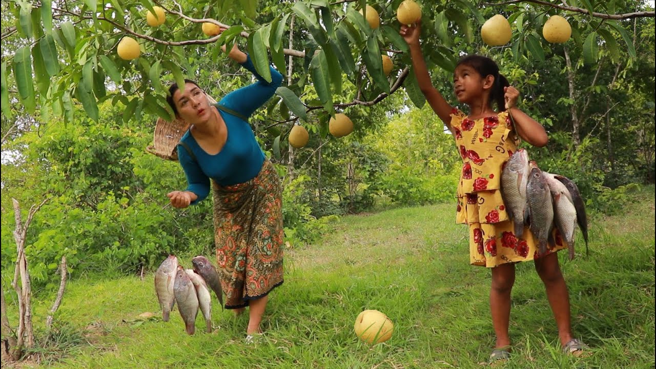 Pick pear fruit in forest- Mother cooking fish crispy for dinner with daughter of survival - YouTube