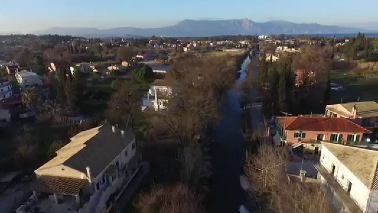 Flying over river of Potamos Corfu Greece - YouTube