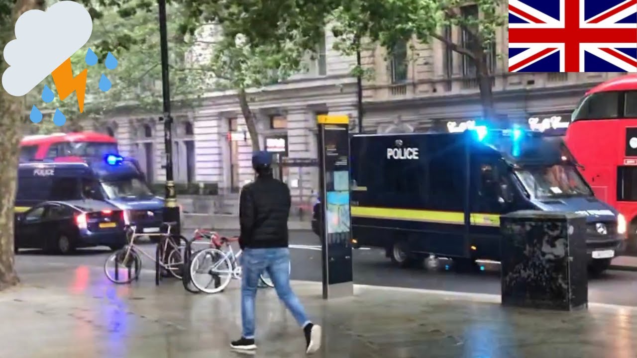 City Of London Police Riot Vans Responding In Convoy In Traditional ...