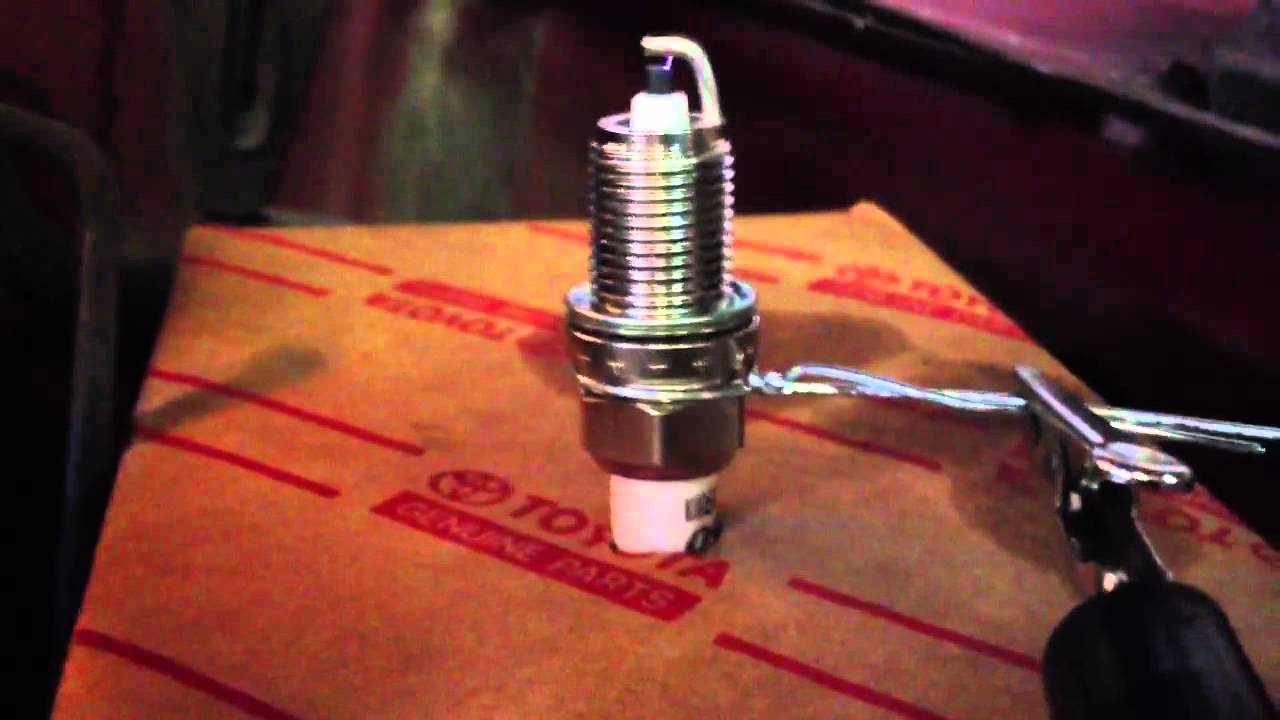 Spark plug in action - YouTube