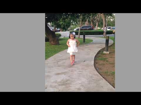 Little girl walking like a model. She’s my princess!
