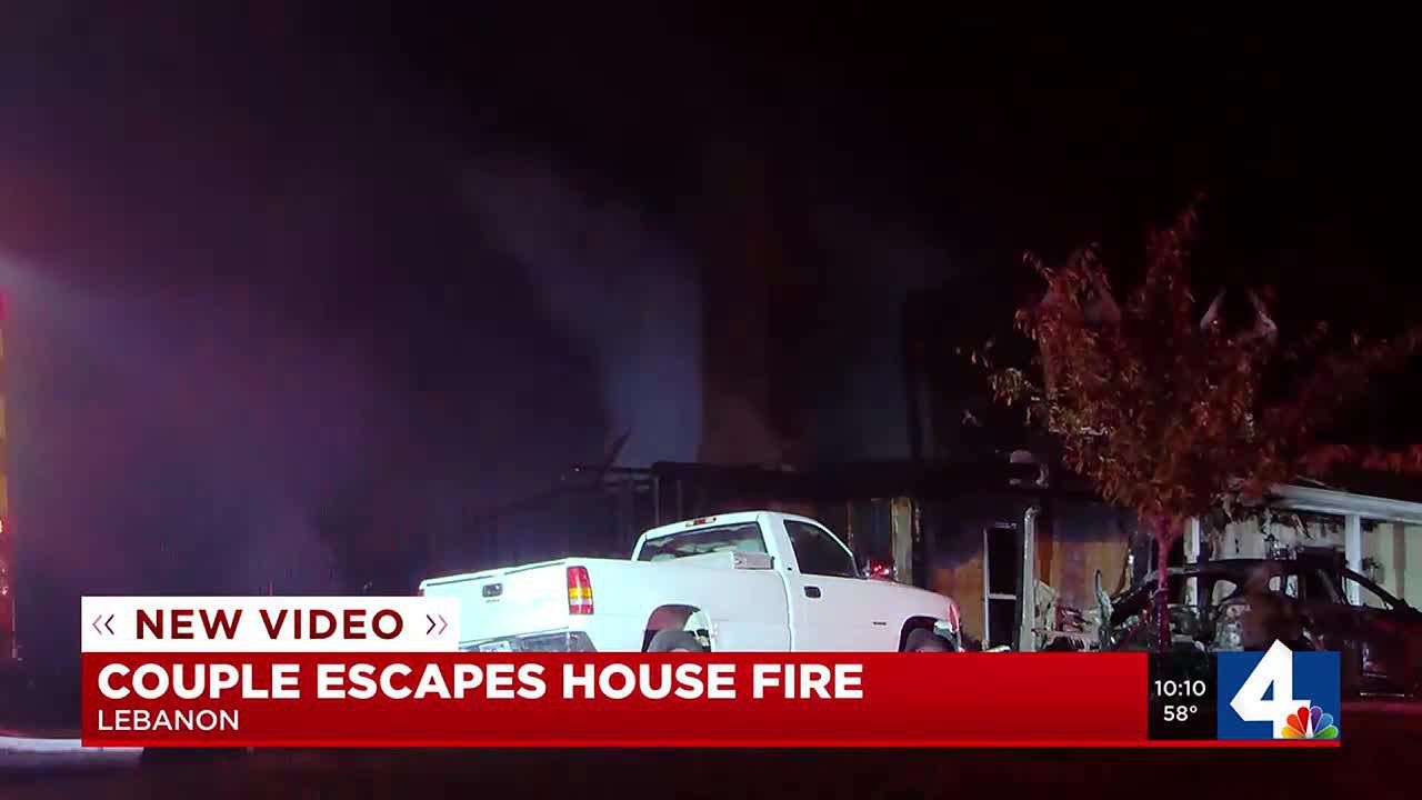 Couple escape Lebanon house fire - YouTube
