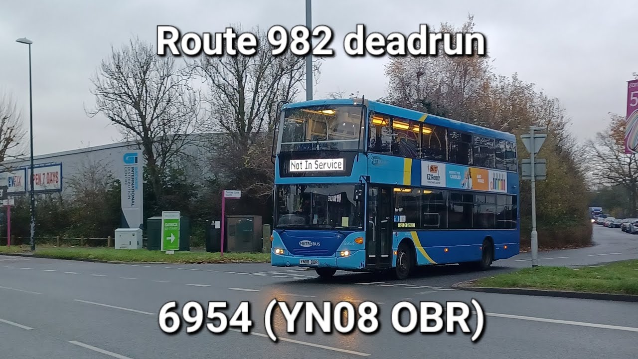 Metrobus Scania N230UD OmniCity 6954 (YN08 OBR) leaves Crawley depot on ...