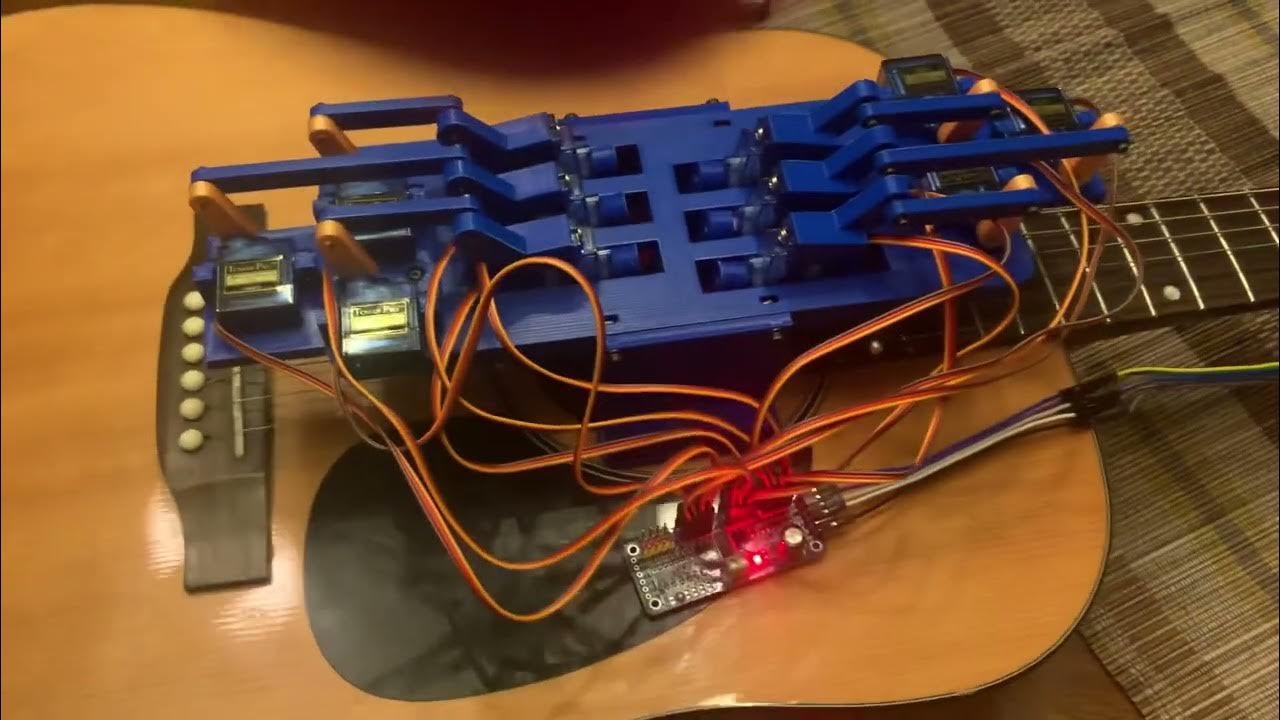 Automated guitar player - YouTube