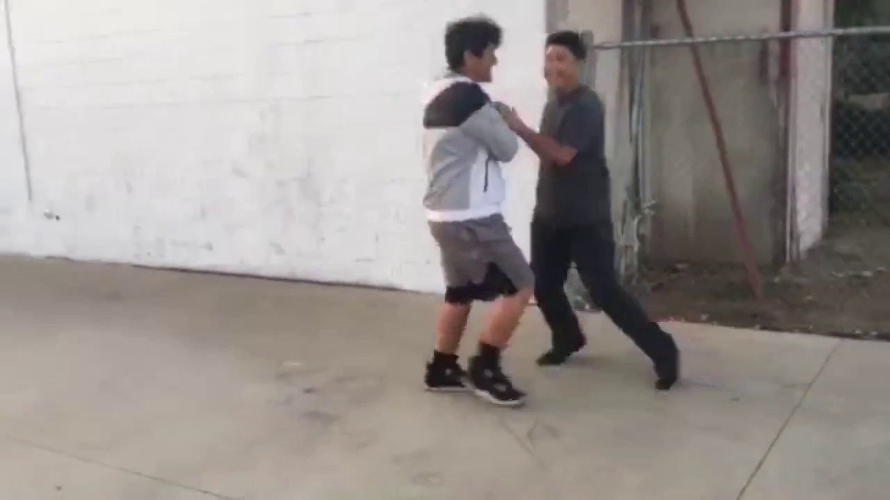 Bully confronted by nerd and "knocked out " - YouTube