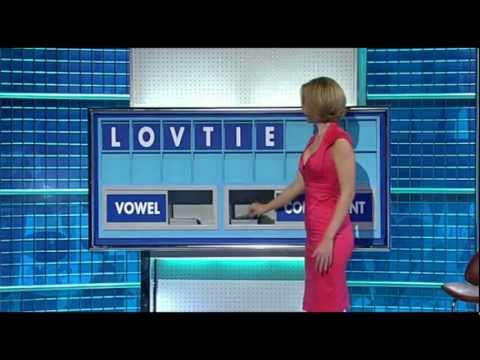 Rachel Riley - Cleavage In Faded Red Dress Matching Shiny Open Toe Heels