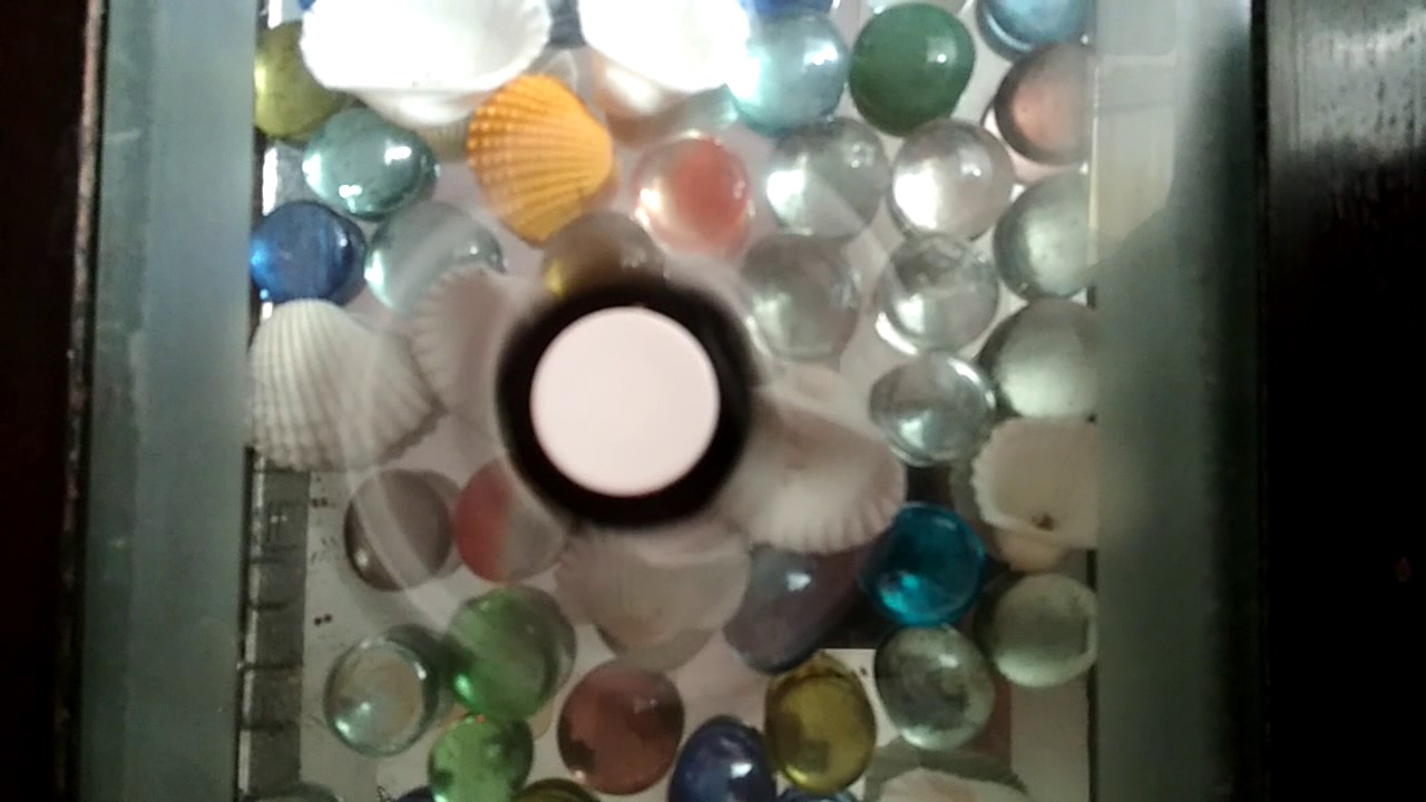 Fidget on pebbles - YouTube