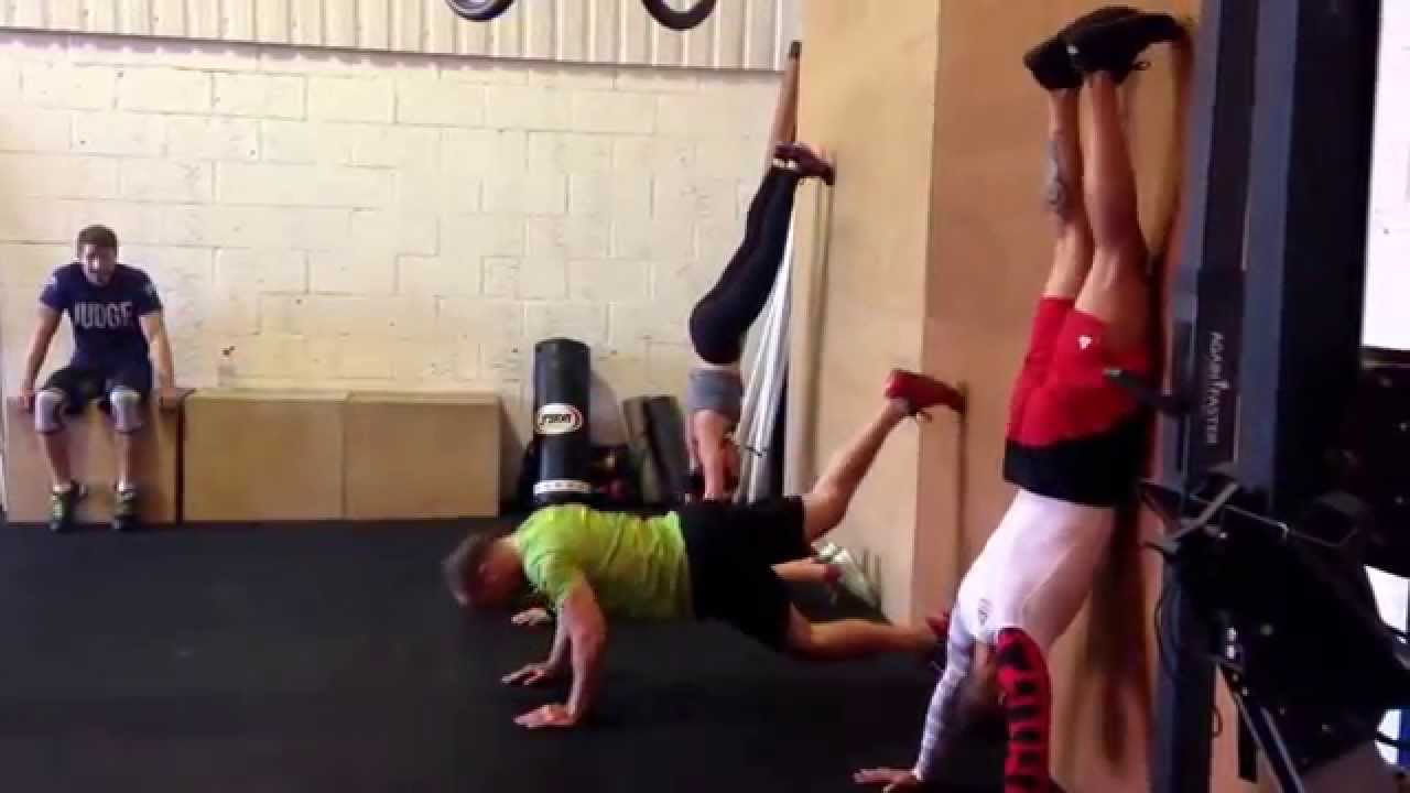 Athletes working on the Wall Walks at Saxon CrossFit, in Wymondham ...