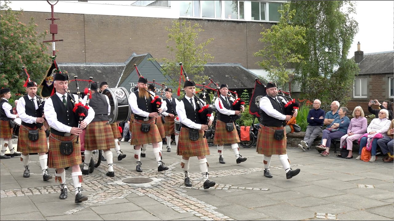 Comrie Pipe Band march off in St James Square Crieff during build up to ...