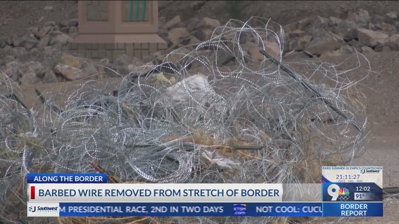 Barbed wire removed from stretch of border - YouTube