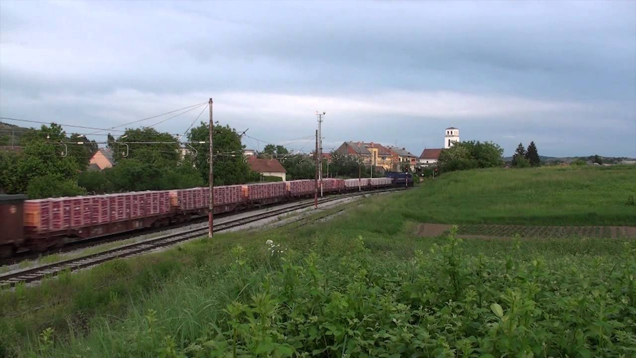 HŽ 2062 114 (EMD G26) + a loaded freight train - YouTube