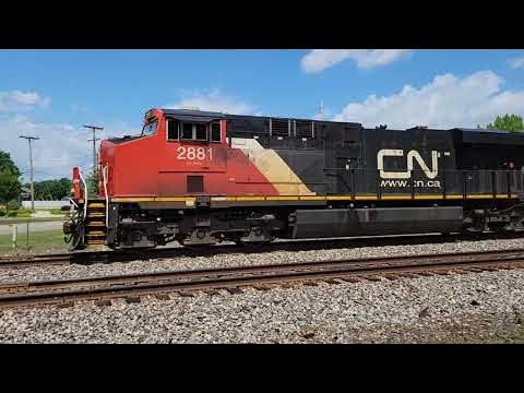 CN 3881, 3277 slipping a Westbound shipping container in well car train past Vicksburg, MI - YouTube
