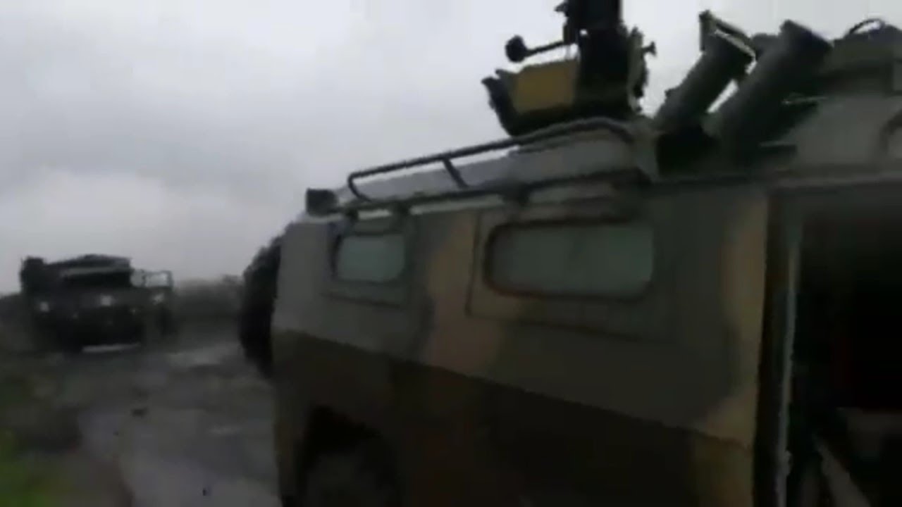 Ukrainian troops inspect a captured Russian Tigr-M - YouTube