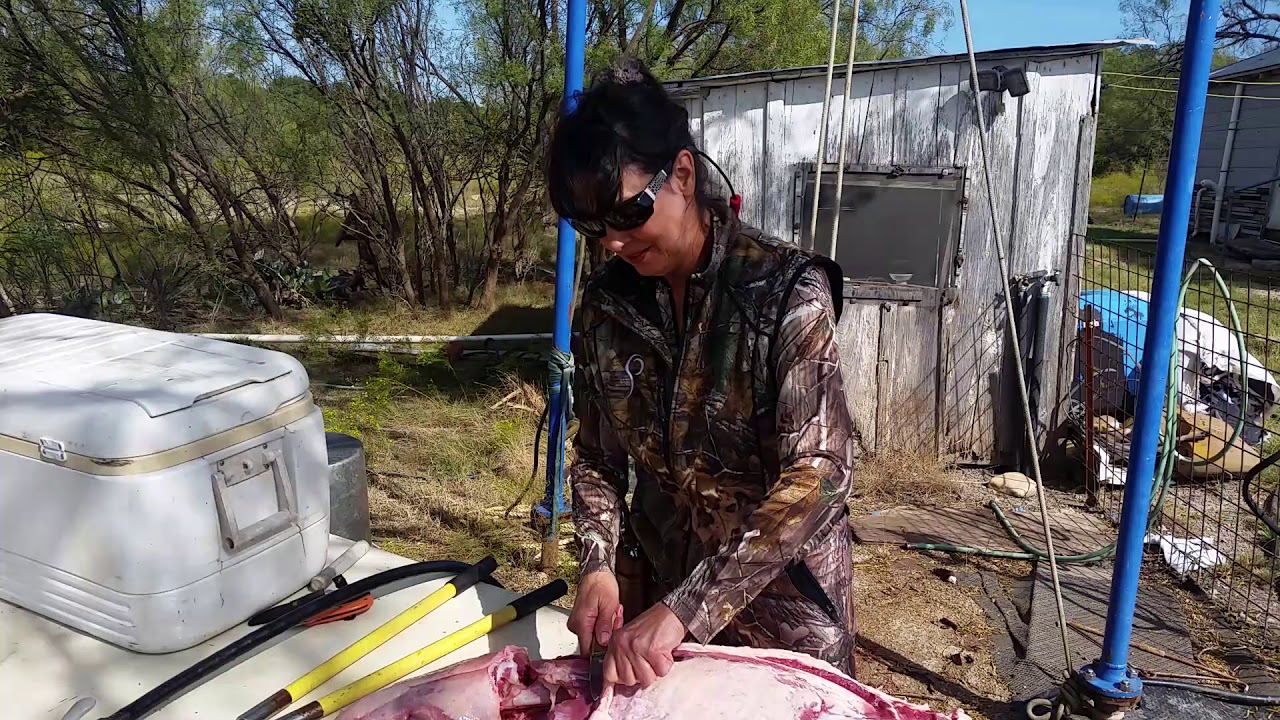 Skinning the hog - YouTube