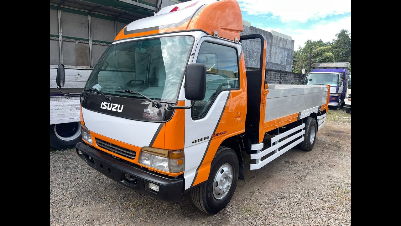 Isuzu Npr drop side - YouTube