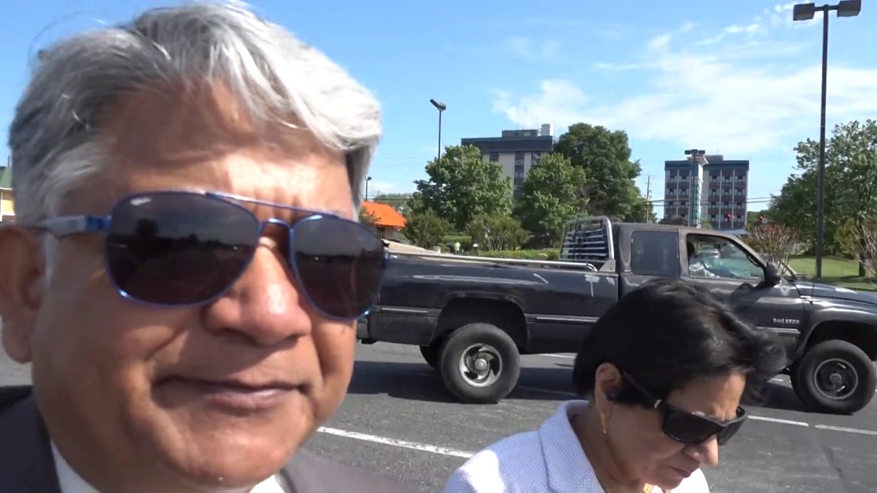 Aruna & Hari Sharma shopping at Rivertowne Commons Marketplace Safeway ...