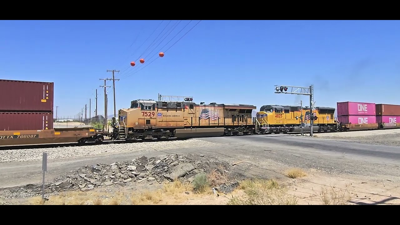 Union Pacific westbound monster autorack/intermodal train with two mid-train in Santa Teresa NM ...