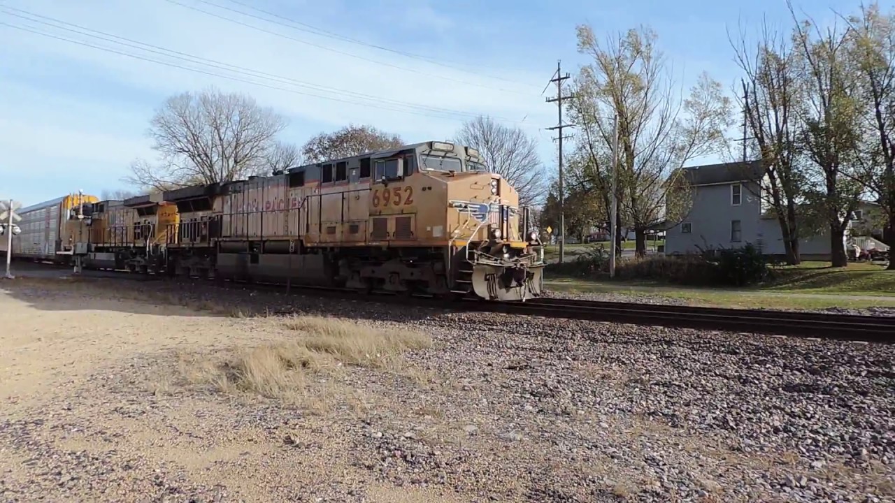 UP autorack west with UP 6307 a recently painted C44AC ex SP - YouTube