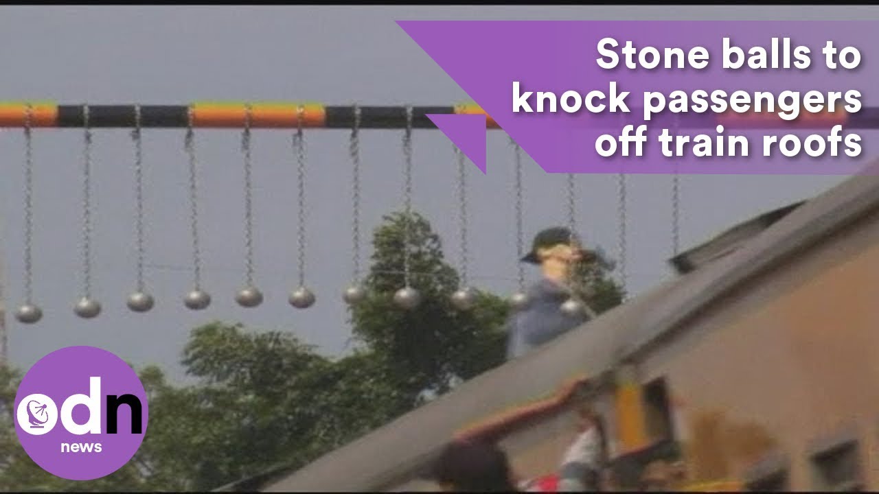 Stone balls to knock passengers off Indonesian train roofs - YouTube